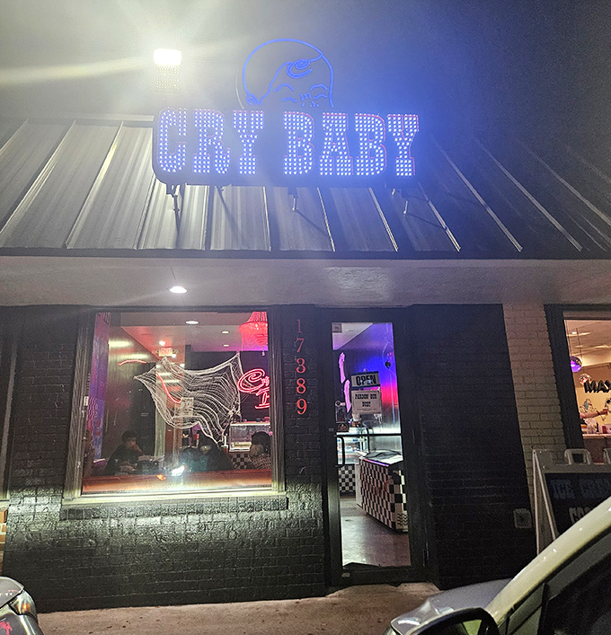 Cry Baby Creamery lights up the night with a blue glow that whispers, "Yes, ice cream for dinner is absolutely acceptable."