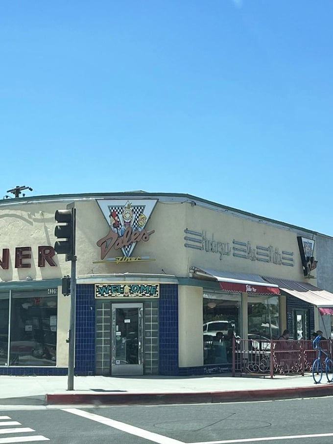 Dale's Diner: Where the checkerboard pattern extends beyond the floor to the perfect balance of crispy and gooey in their legendary grilled cheese sandwiches. 
