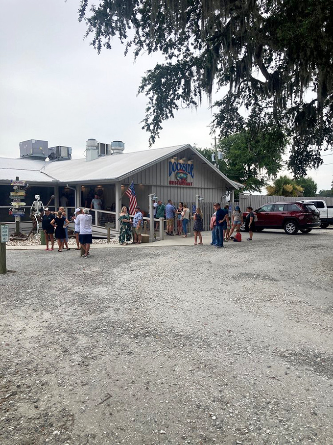 That crowd gathering outside isn't waiting for a concert; they're queuing up for what locals consider liquid gold in pizza form.