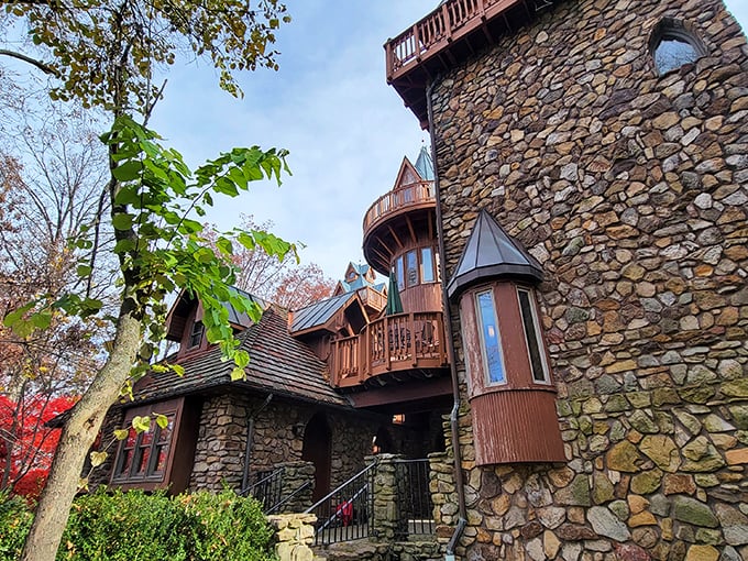 Wooden balconies and stone towers create a magical silhouette against the sky at Landoll's Castle. Room service with a royal flair!