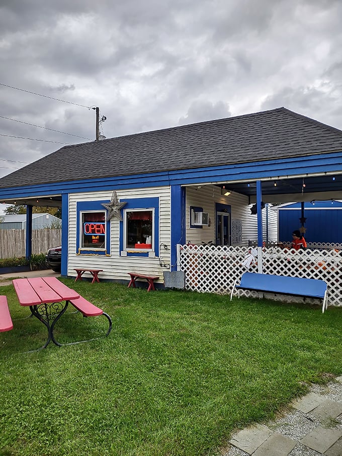 The cozy blue cottage of Laura's Little Burger Joint promises roadside comfort that elevates the humble hamburger to art.