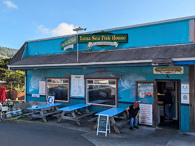 That cheerful turquoise paint job matches the owner's enthusiasm for bringing his daily catch straight to your plate.