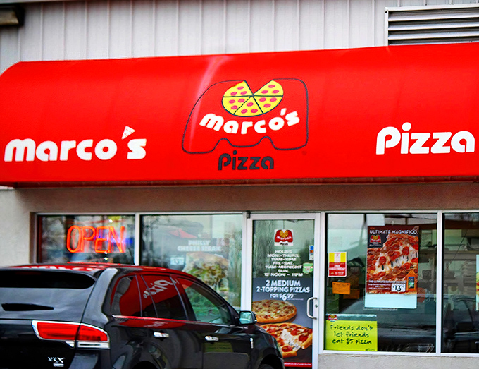 Simple white building, bold red sign &ndash; Marco's knows flashy exteriors don't matter when what's coming out of the oven is pure magic.