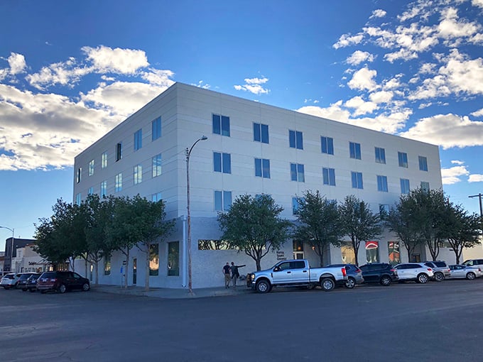 Modern meets West Texas in downtown Marfa. Even the clouds seem to slow down for a better look!