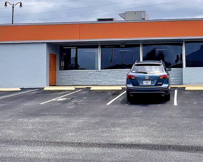 The bright orange accent on Mel's Family Diner is like a beacon calling hungry travelers to some of Sanford's best comfort food.