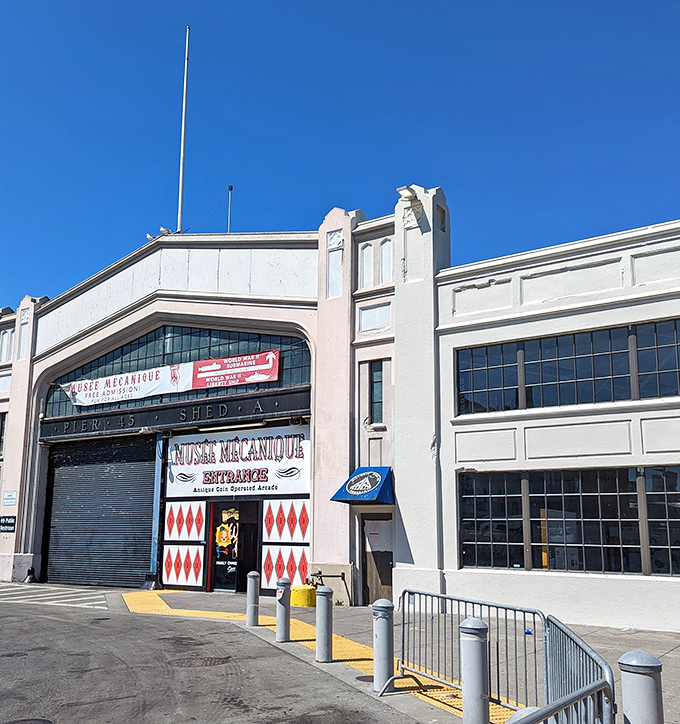 Historic Pier 45 architecture frames an antique arcade where quarters still buy genuine old-fashioned fun.