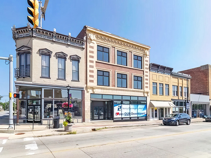 Sunlight plays across these historic facades like it's highlighting the "affordable living" section of a travel brochure. Small-town prices with timeless appeal!
