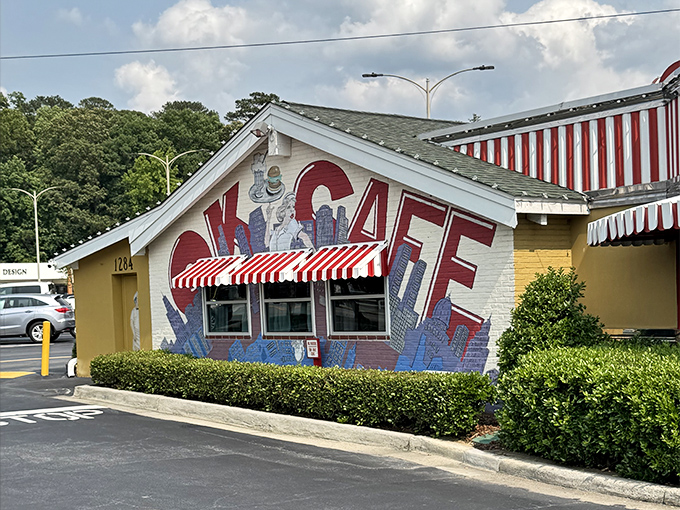 That playful OK Cafe mural practically winks at you, promising breakfast worth pulling off West Paces Ferry for.