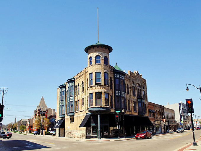 Oshkosh's elegant corner building whispers stories of yesteryear. Living affordably doesn't mean sacrificing architectural beauty in this gem.