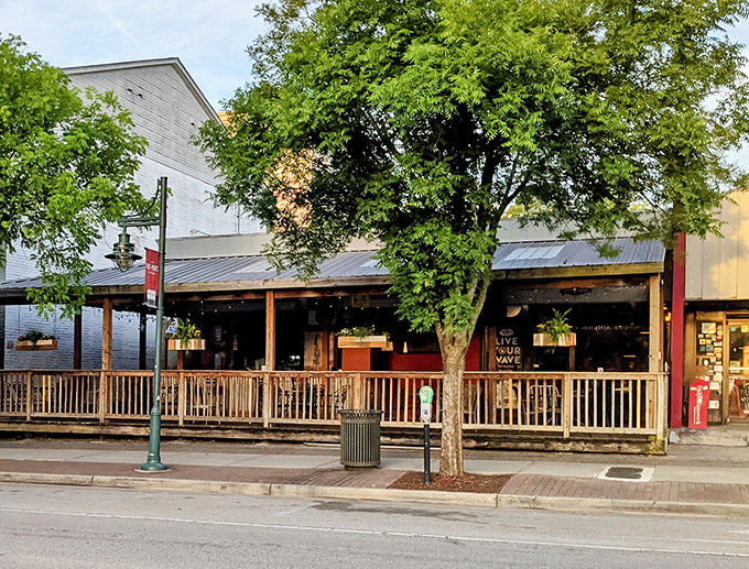 Those hanging plants and wooden railings create the perfect backdrop for the serious burger business happening inside Pawley's Front Porch.