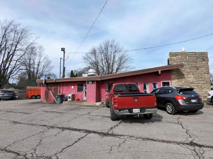 That weathered exterior tells stories of countless winter storms and summer crowds, all coming for the legendary tenderloins.