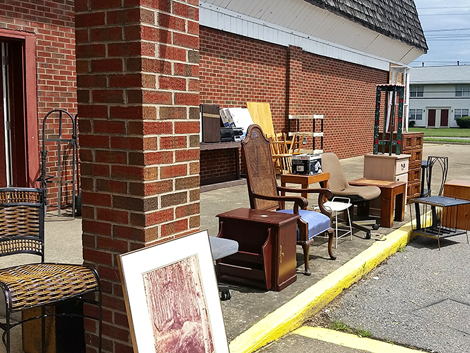 Yesterday's furniture finds new life outside Supreme Flea Market. That chair might have stories to tell!