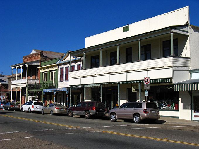 American flags flutter above Sutter Creek's timeworn buildings. Some towns just wear their history better than others.