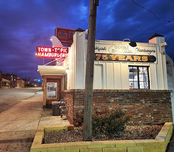 Night transforms Town Topic into a glowing burger beacon. Those neon lights have guided hungry souls to slider salvation through good times and bad.
