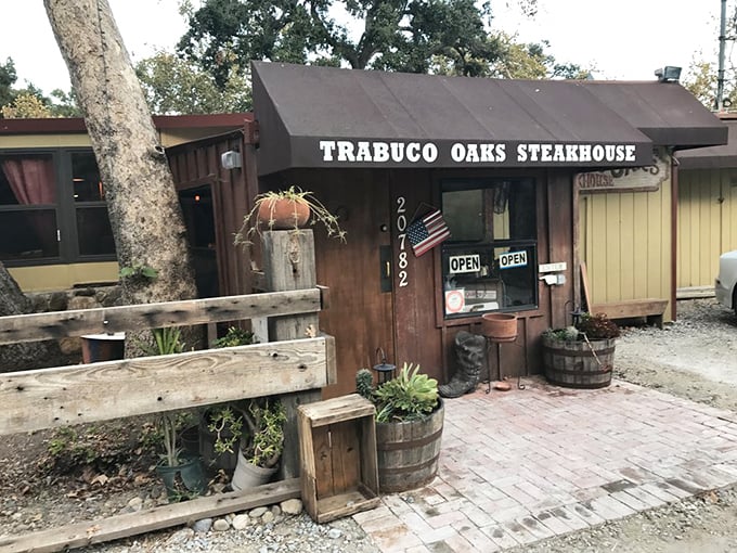 Blink and you'll miss this hidden gem in Trabuco Canyon. The simple wooden facade conceals a legendary steakhouse where ties are forbidden and portions are enormous.