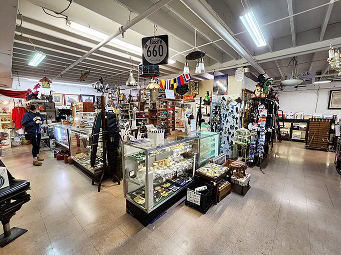 Glass cases protect delicate treasures while vintage signs and memorabilia transport you through decades of American culture.