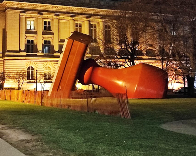 This crimson giant transforms mundane paperwork into public art, proving that bureaucracy can actually be beautiful and fun.