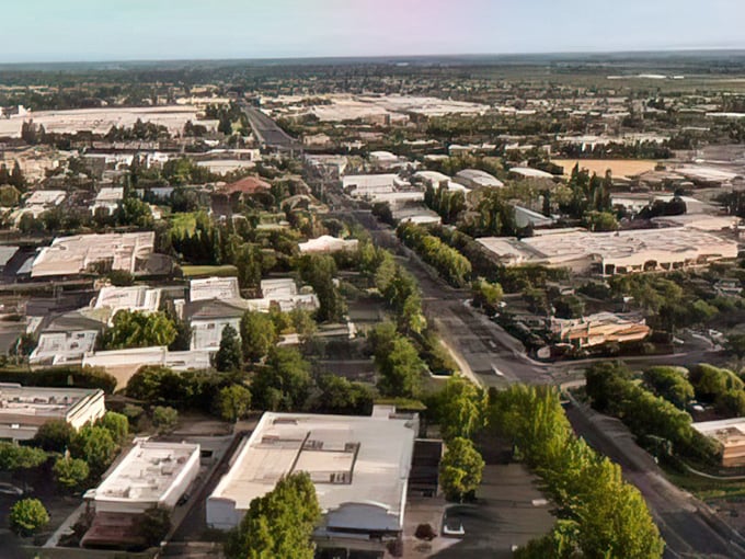 From above, Yuba City spreads out like a carefully arranged model town where someone got a little carried away with the commercial district.