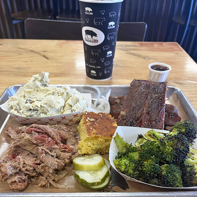 The barbecue equivalent of a greatest hits album. Pulled pork, brisket, potato salad, and cornbread&mdash;no skips on this playlist.