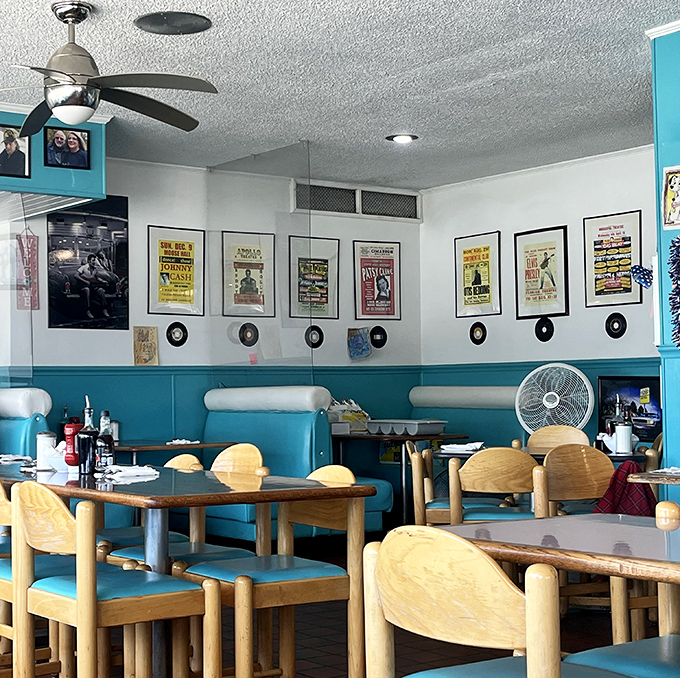 The vintage concert posters and vinyl records aren't just decoration&mdash;they're the soundtrack to your meal, taking you back to when Elvis was king and milkshakes had real ice cream.
