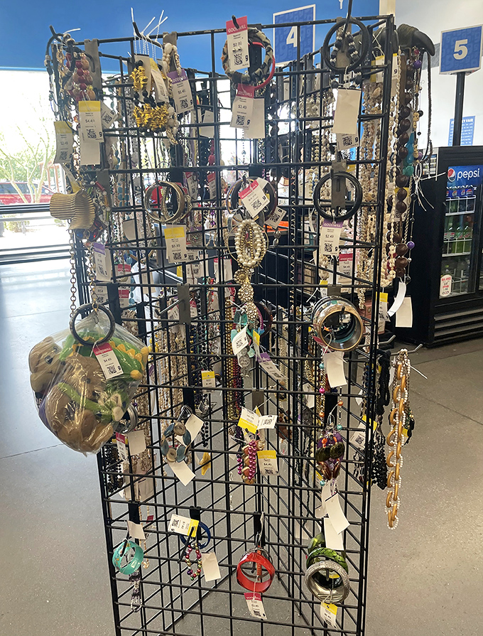 Jewelry display that puts the "hunt" in treasure hunting. That perfect statement necklace is hiding somewhere between vintage clip-ons and 90s mood rings.