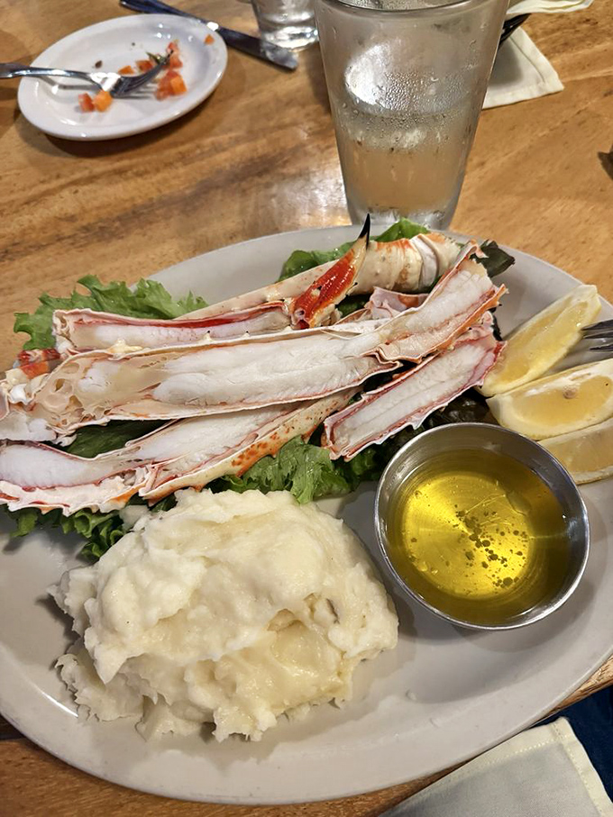 Alaskan crab legs presented with simple elegance&mdash;nature's perfect design requiring nothing more than drawn butter and determination.
