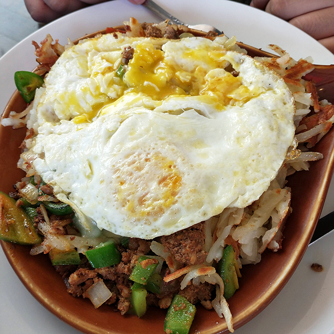When breakfast can't decide what it wants to be, it becomes this glorious skillet&mdash;a mountain of ingredients with a perfectly fried egg summit.