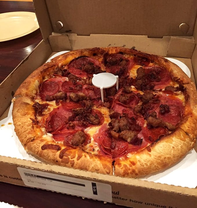 The carnivore's dream – where pepperoni and sausage join forces in a meaty alliance that would make Ron Swanson weep with joy.