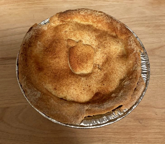 This golden-crusted apple pie looks like it should be cooling on a windowsill while cartoon birds sing around it. Norman Rockwell would approve.