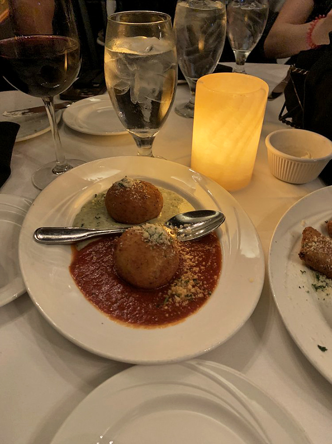 These arancini balls sitting in dual sauces are like the Odd Couple of appetizers &ndash; different personalities that somehow create perfect harmony.