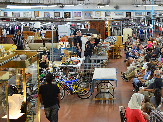 Part community gathering, part treasure auction. The excitement in the air is thicker than the bidding paddles being waved enthusiastically.