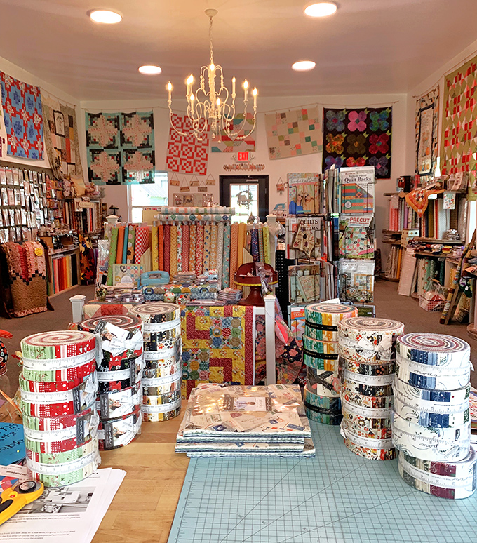 Fabric heaven awaits quilting enthusiasts in this charming shop where creativity flows as freely as the conversations between fellow crafters.