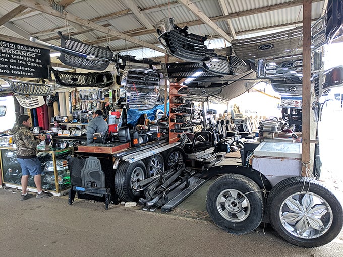 Gearhead paradise! Auto parts hang like industrial chandeliers, where car enthusiasts can find that elusive piece to complete their mechanical puzzle.