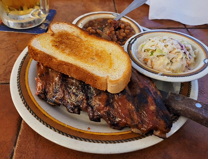 Ribs, baked beans, and Texas toast: the holy trinity of Southern comfort. This plate doesn't just feed your body&mdash;it hugs your soul.