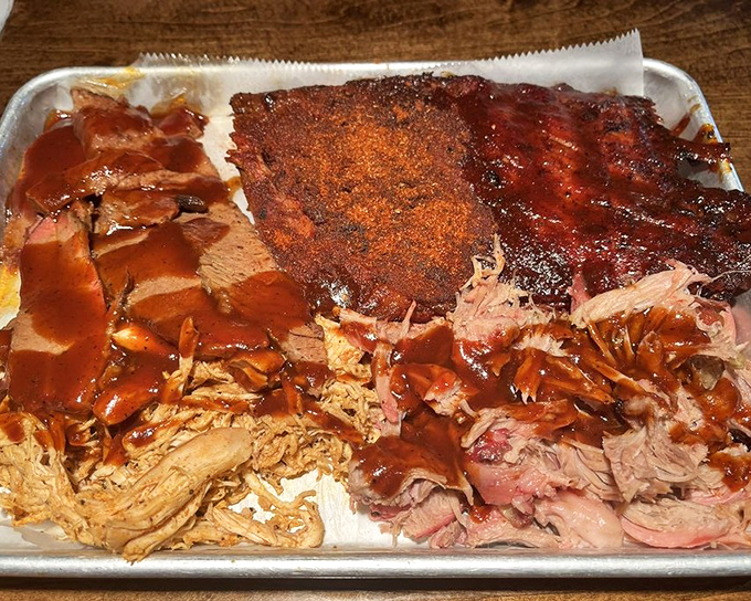 This BBQ platter isn't a meal; it's a guided tour through Memphis flavor country. The pulled pork and ribs are co-headlining this delicious concert.