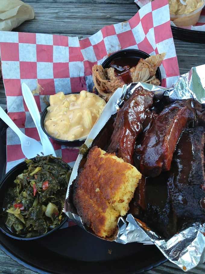 A BBQ platter that belongs in the Louvre&mdash;glistening ribs, tender pulled pork, mac and cheese, and collards that would make any Southerner weep with joy.
