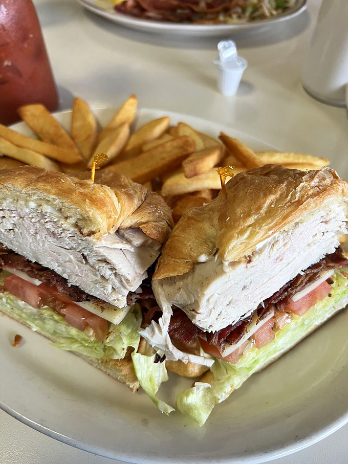 The club sandwich that requires engineering skills to eat. Stacked higher than some LA apartment buildings and twice as satisfying.