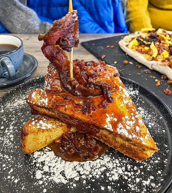 French toast that's dressed for the prom of breakfast foods. That bacon garnish isn't just decoration&mdash;it's like putting a crown on royalty.