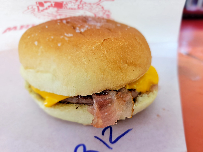 A bacon cheeseburger that doesn't need Instagram filters or fancy aioli. Just honest beef, melty cheese, and bacon that means business.