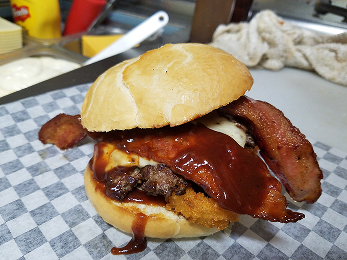 A bacon cheeseburger so perfect it deserves its own Instagram account. The BBQ sauce drip adds that crucial element of delicious danger.