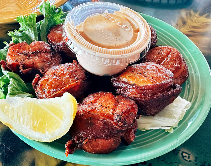 Bacon-wrapped scallops: proof that sometimes the best things in life come dressed in pork formal wear.