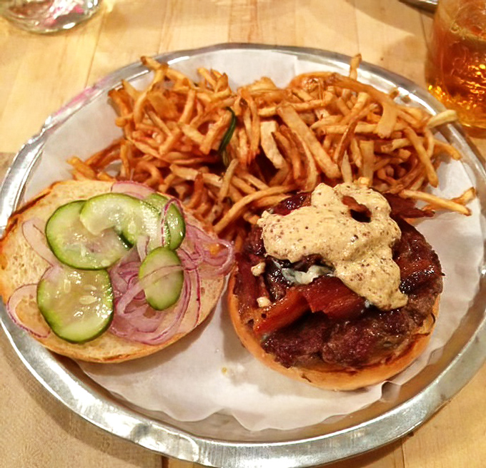When bacon and blue cheese join forces atop a perfectly seared burger, it's like a flavor symphony where every bite hits a different delicious note.