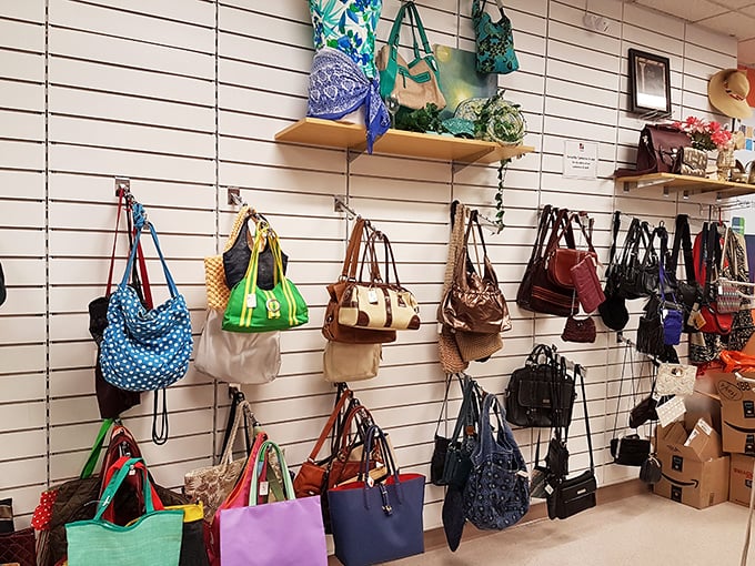 Handbag heaven for the accessory enthusiast, where designer-inspired styles and practical totes hang in colorful formation like fashion fruit ripe for picking.