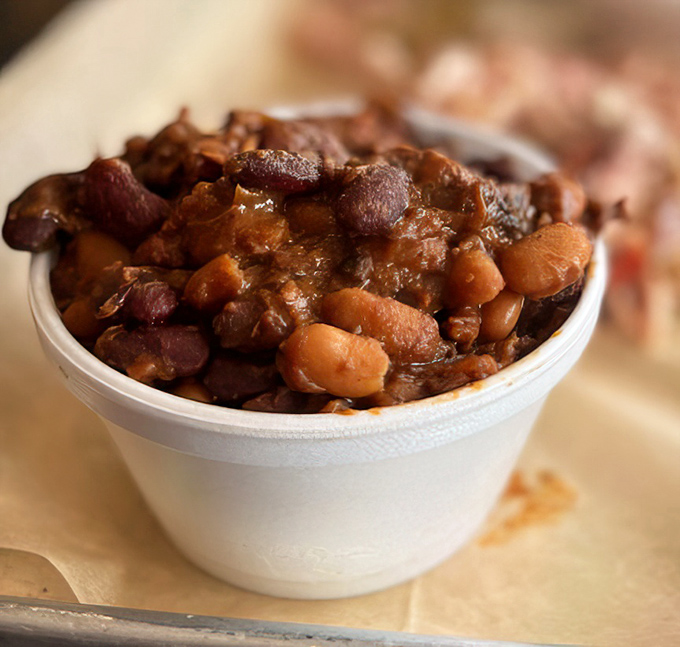 These beans have clearly been introduced to multiple members of the pork family. A symphony of sweet, savory, and smoky in every spoonful.