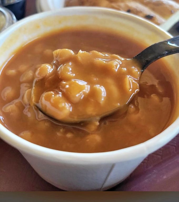 These beans have clearly been taking notes during the smoking process &ndash; rich, saucy, and studded with enough meat to make vegetarians nervously reconsider.