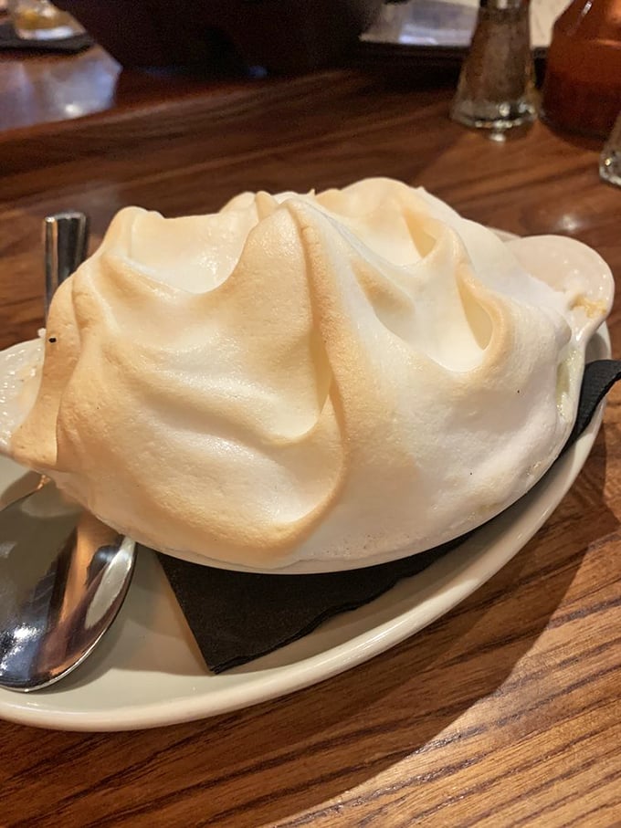 Banana pudding crowned with a cloud of meringue that's toasted to golden perfection&mdash;proof that angels work in The Pit's kitchen.