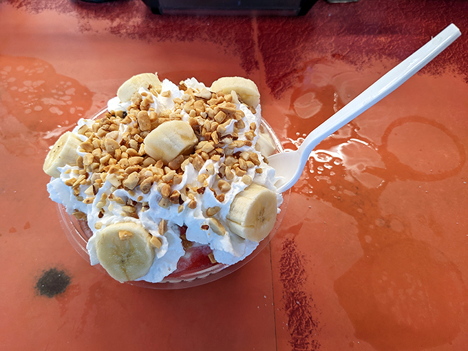 Ice cream architecture at its finest&mdash;bananas, whipped cream, and crunchy toppings creating a dessert skyline Frank Lloyd Wright would approve of.