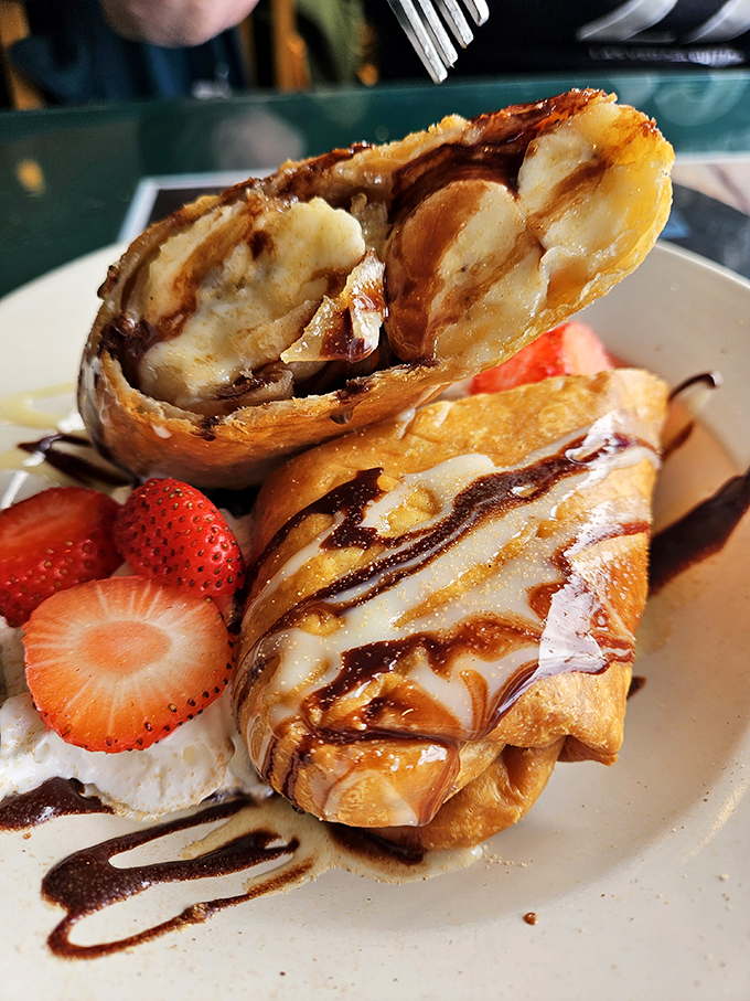 Not just dessert, but a vacation on a plate&mdash;warm, crispy churros filled with banana and drizzled with chocolate that would make your diet plan file for divorce.