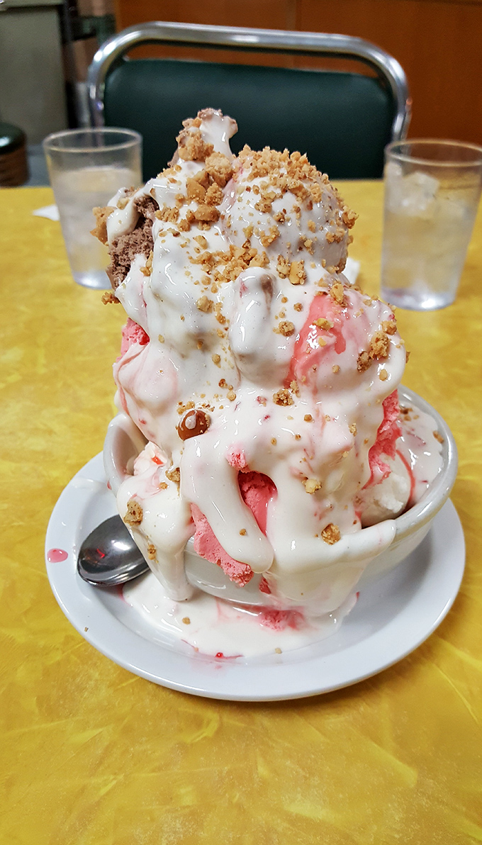 Not all sundaes are created equal. This towering creation with strawberry ice cream and marshmallow topping is basically dessert royalty.