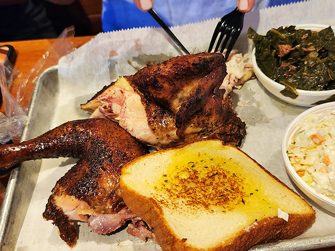 Chicken that proves poultry deserves respect in barbecue country&mdash;smoky, juicy, and paired with sides that complement rather than compete.